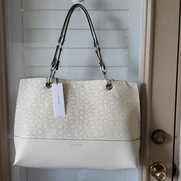 Calvin Klein | Bags | Calvin Klein Logo Reversible Tote Wmatching Pouch ...